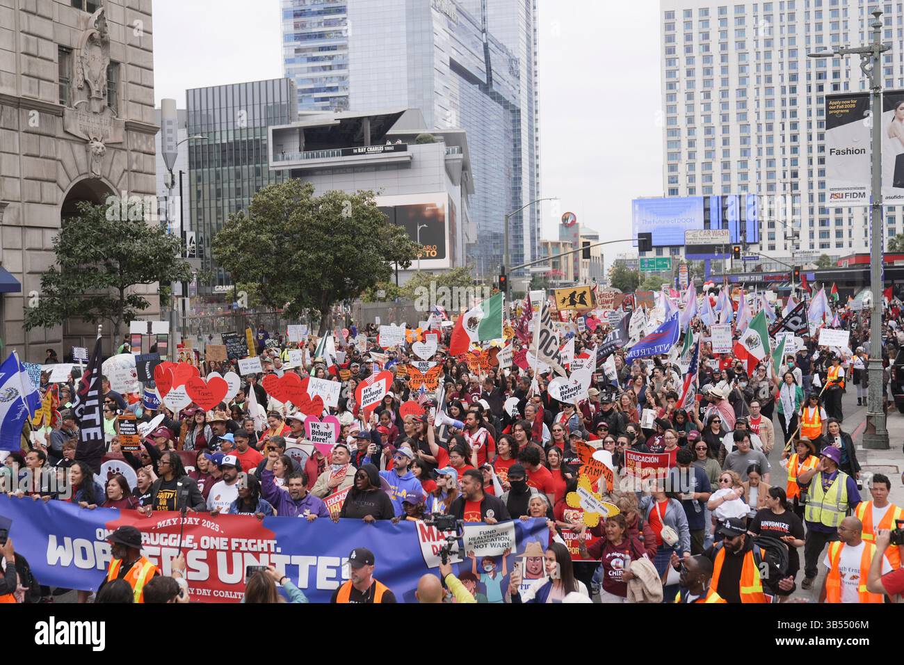 Demonstrators march during a May Day protest Thursday, May 1, 2025, in ...