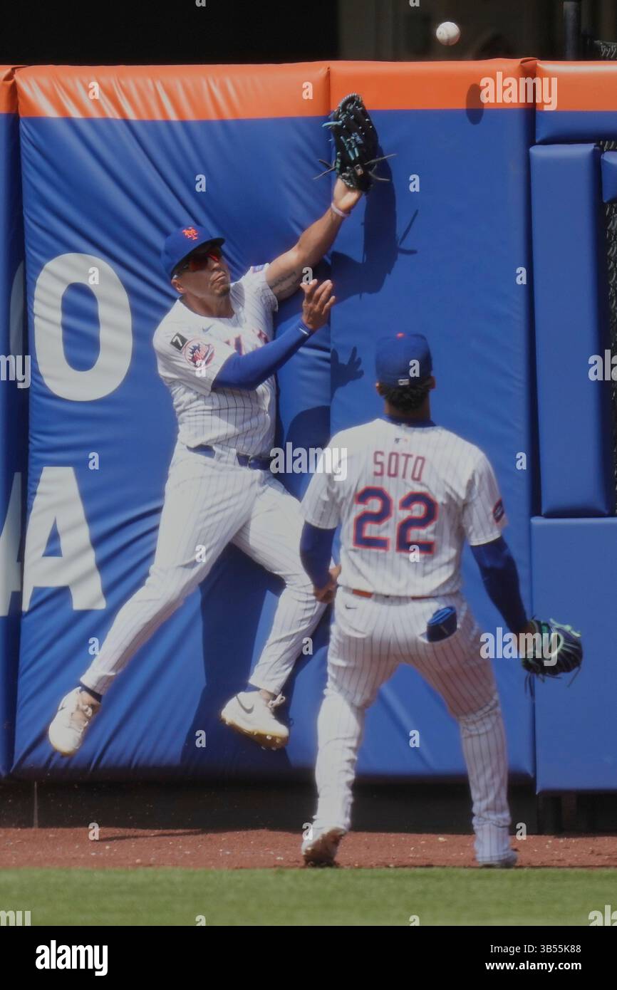 New York Mets outfielder Juan Soto, right, looks on as Tyrone Taylor ...