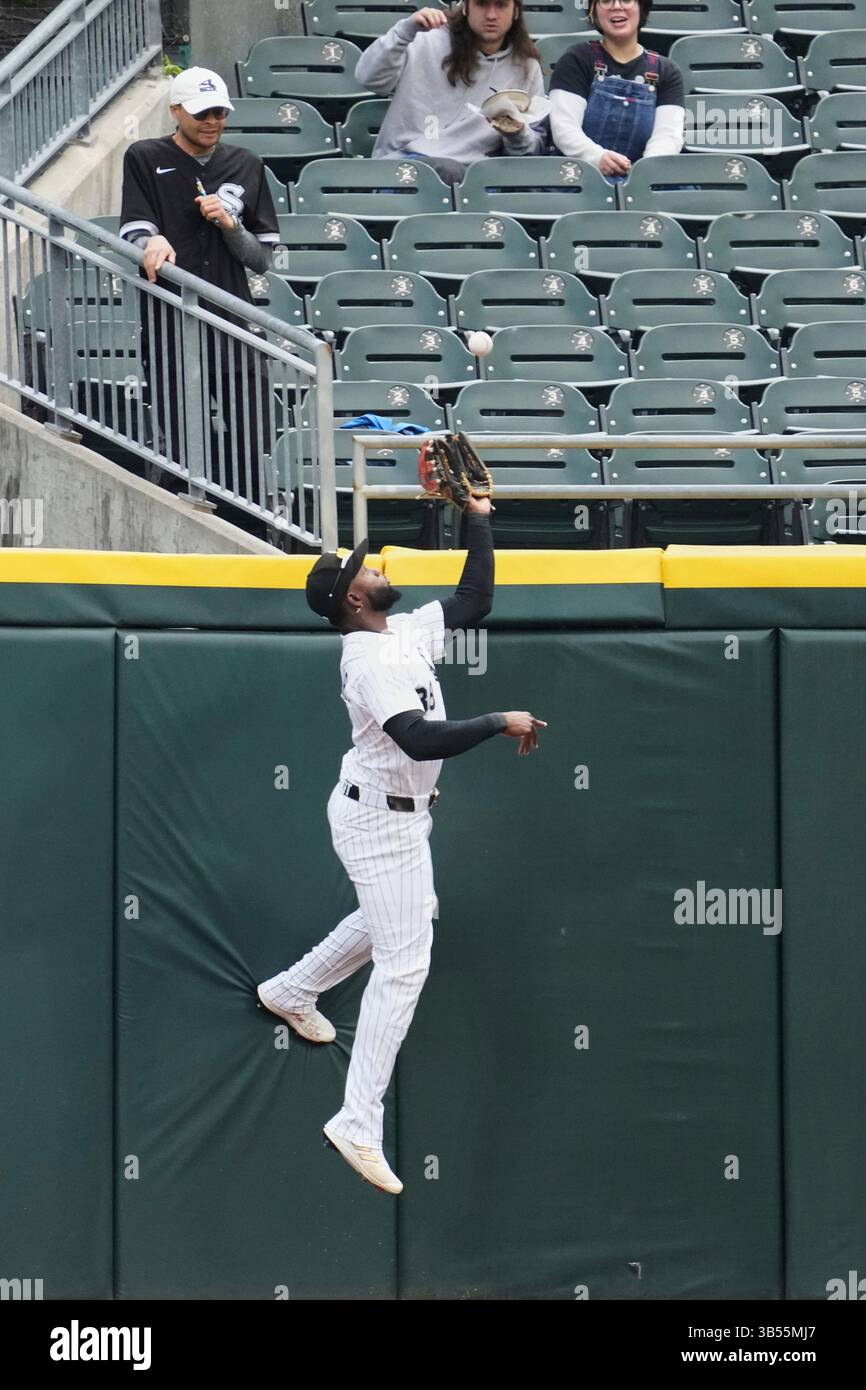 Chicago White Sox center fielder Luis Robert Jr., makes a leaping catch ...