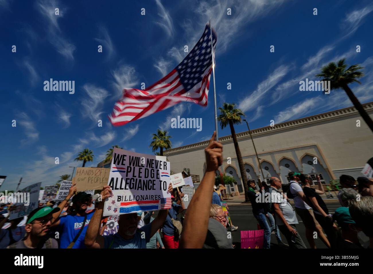 Demonstrators march during a May Day protest at the Capitol, Thursday ...