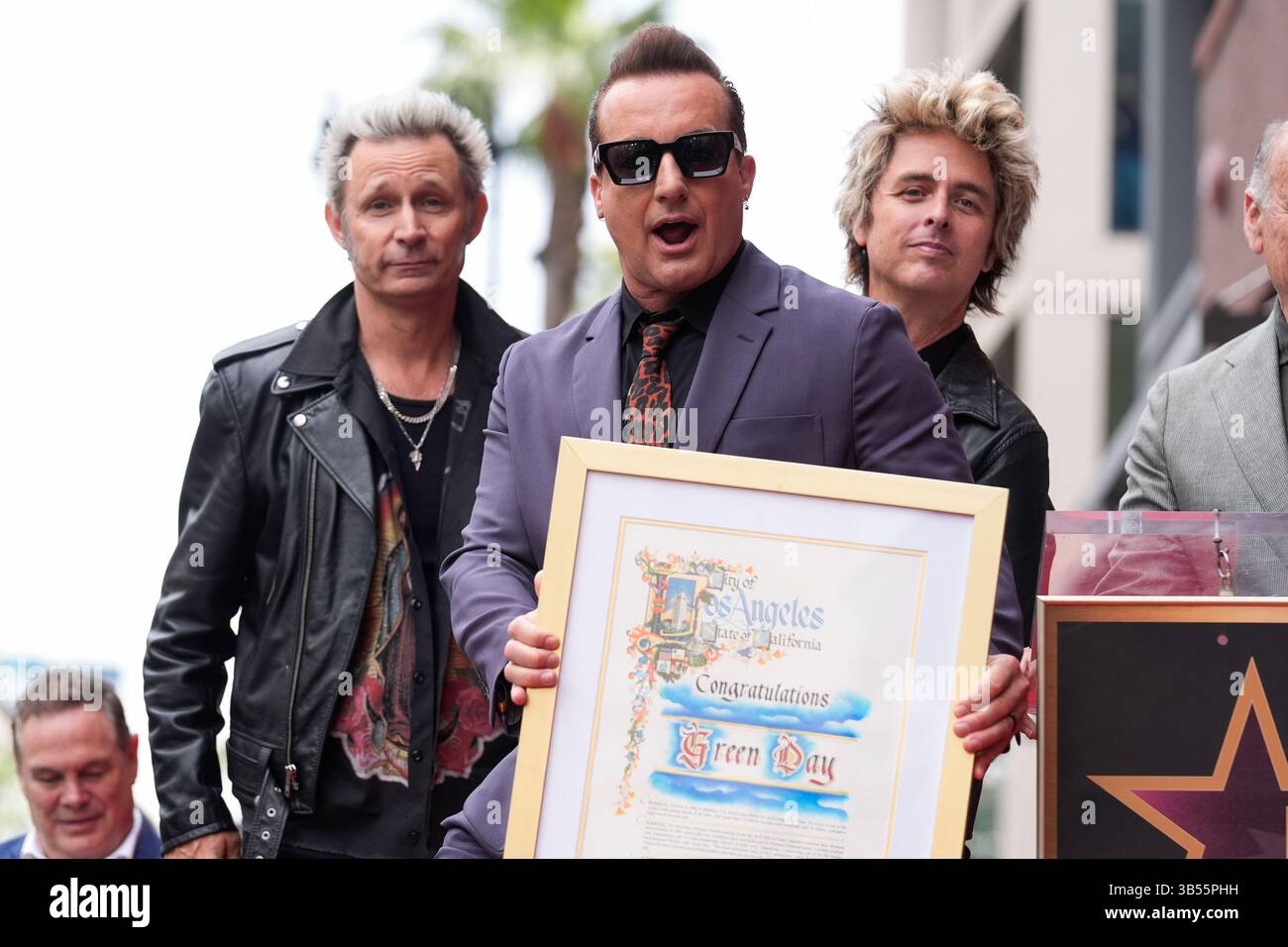 Mike Dirnt, from left, Tre Cool, and Billie Joe Armstrong of Green Day ...