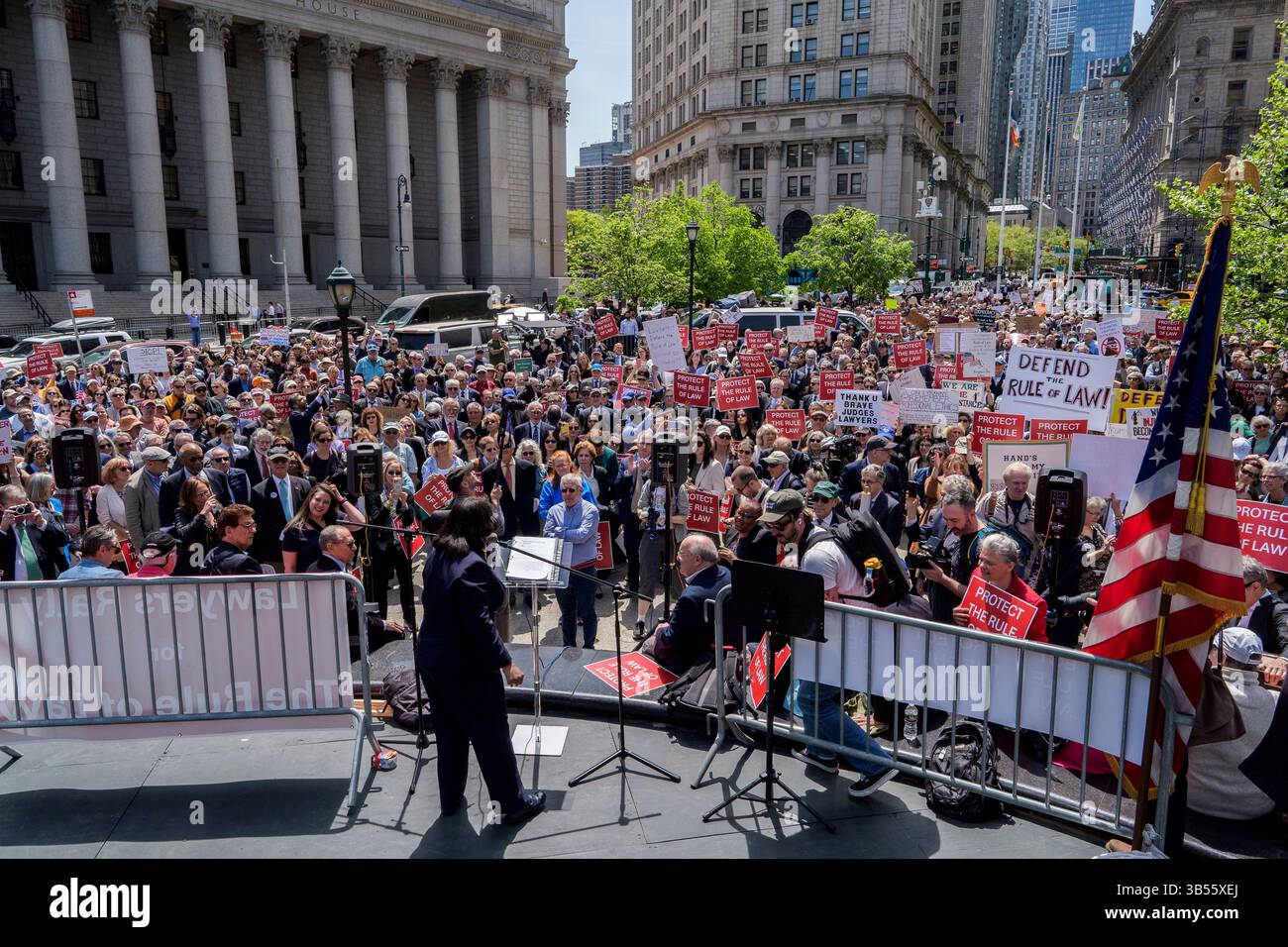 People take part in a May Day rally for the Rule of Law, Thursday, May ...