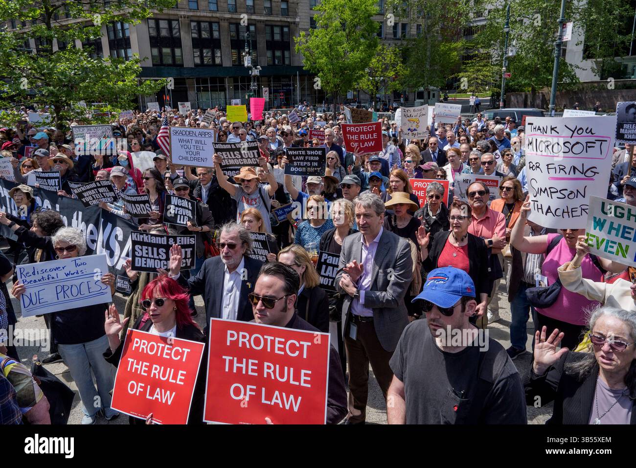 People take part in a May Day rally for the Rule of Law, Thursday, May ...