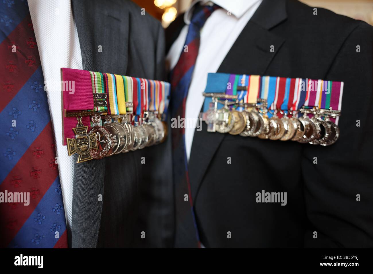 Victoria and George Cross medals worn by their winners during a ...