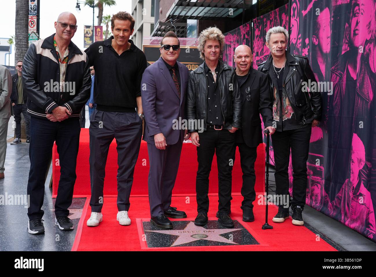 Rob Cavallo, from left, Ryan Reynolds, Tre Cool, Billie Joe Armstrong ...