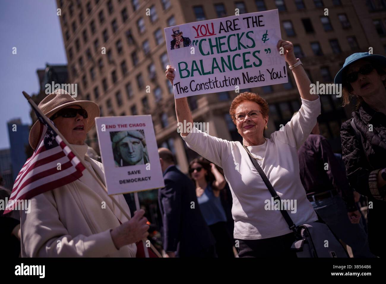 People take part in a May Day rally for the Rule of Law, Thursday, May ...