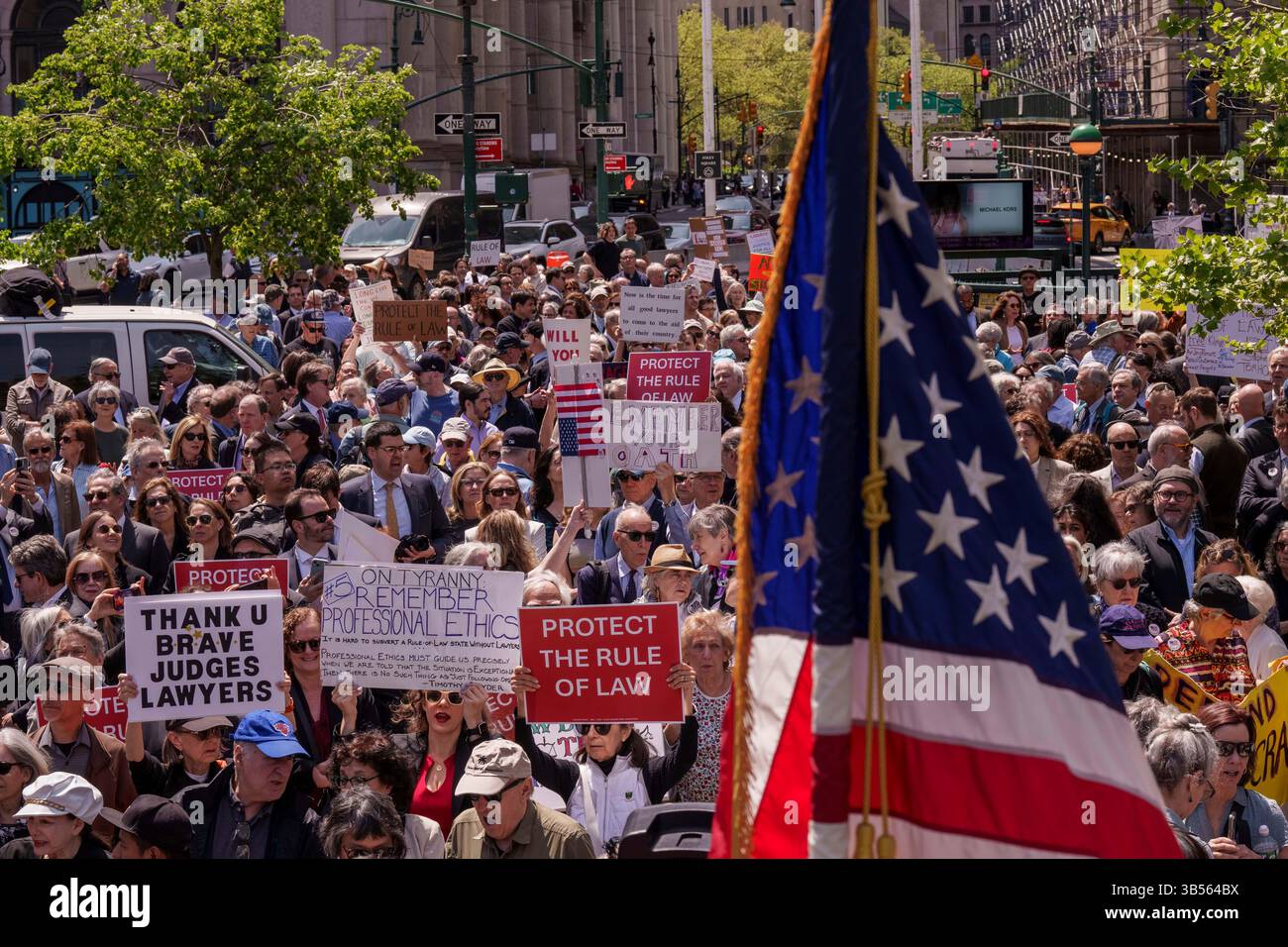 People take part in a May Day rally for the Rule of Law, Thursday, May ...