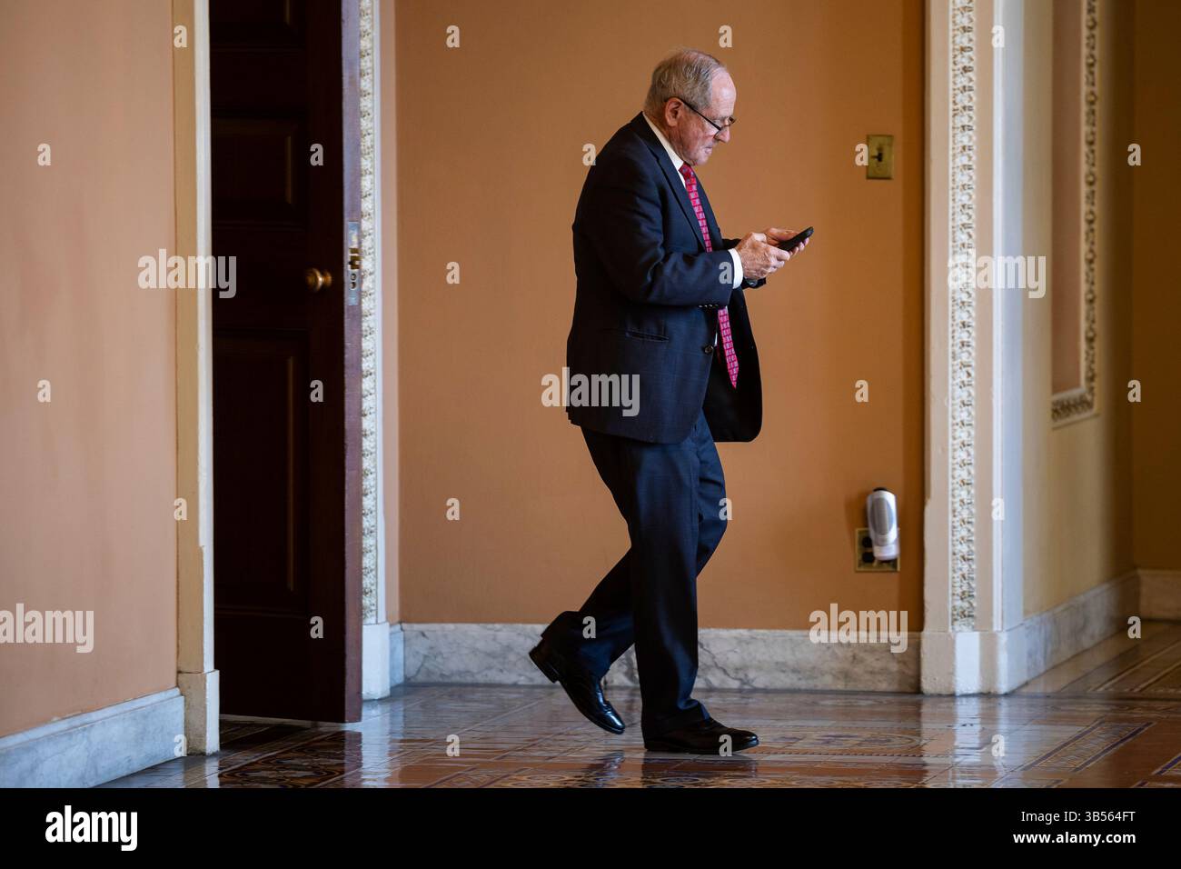 Senate Foreign Relations Committee Chair James Risch (R-Idaho) checks ...