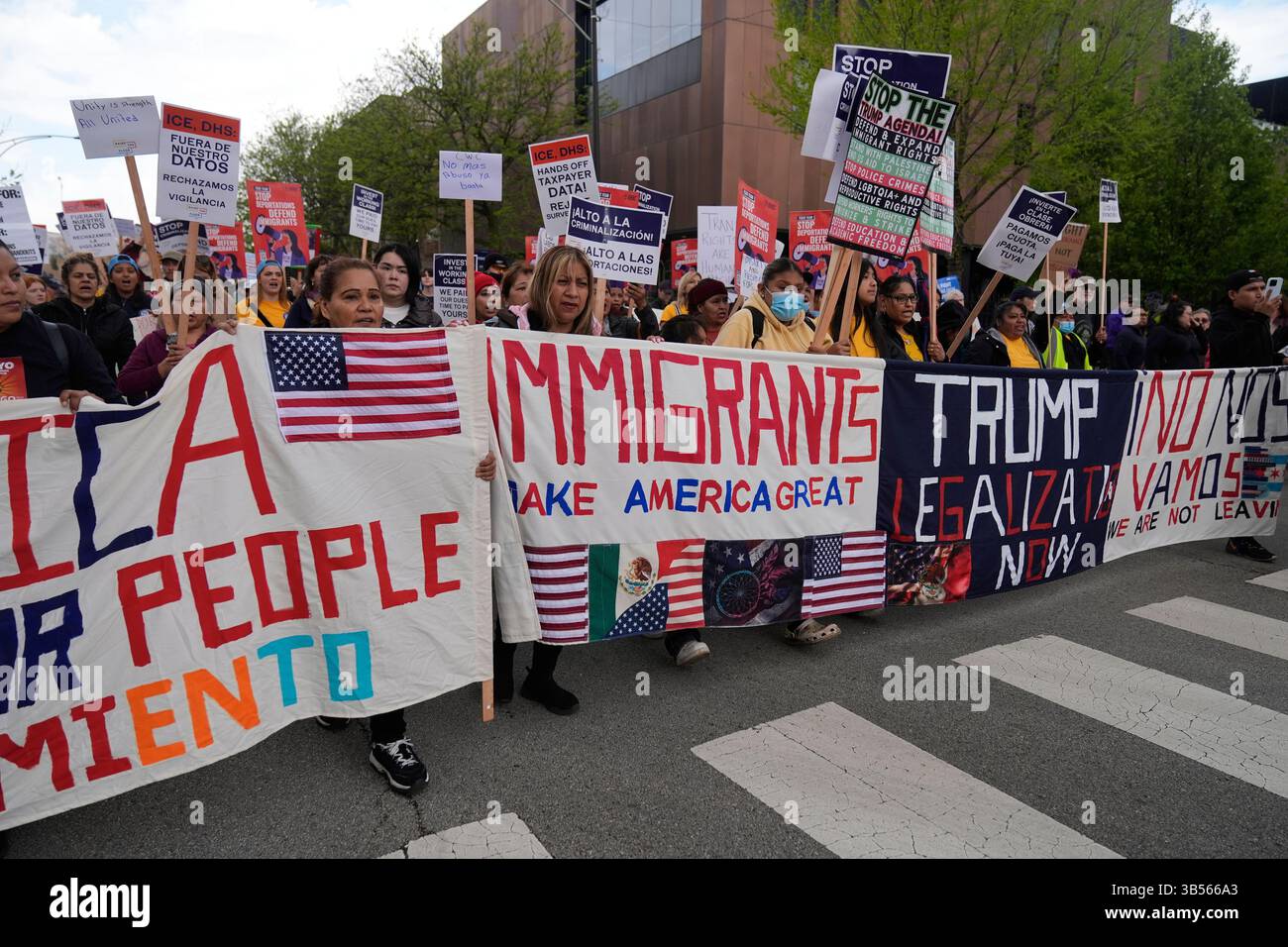 Thousands of people march in a May Day rally and protest Thursday, May ...