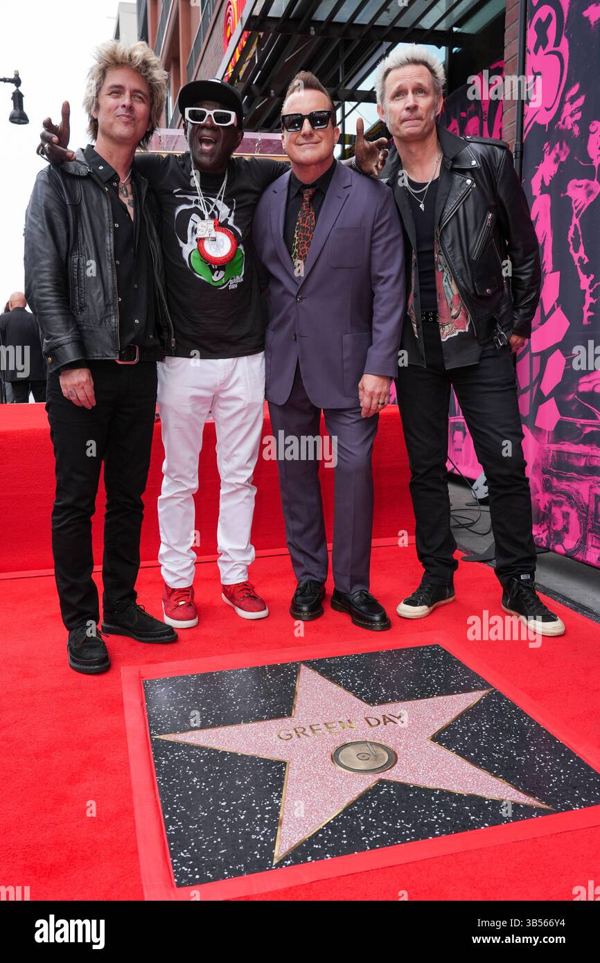 Billie Joe Armstrong, from left, Flavor Flav, Tre Cool, and Mike Dirnt ...