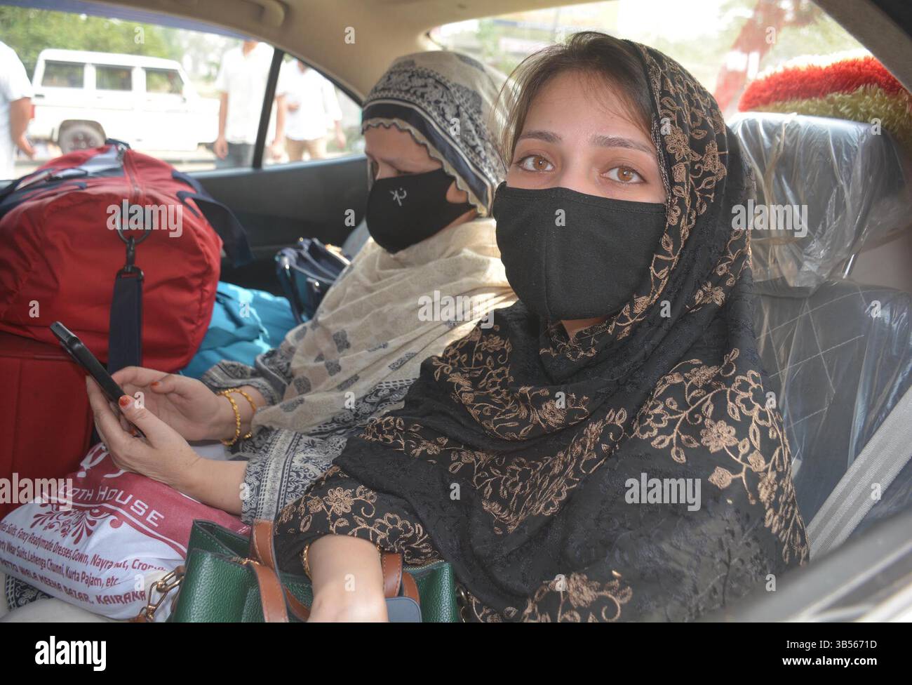 AMRITSAR, INDIA - MAY 1: Indian passport holder Namra from UP wait to ...