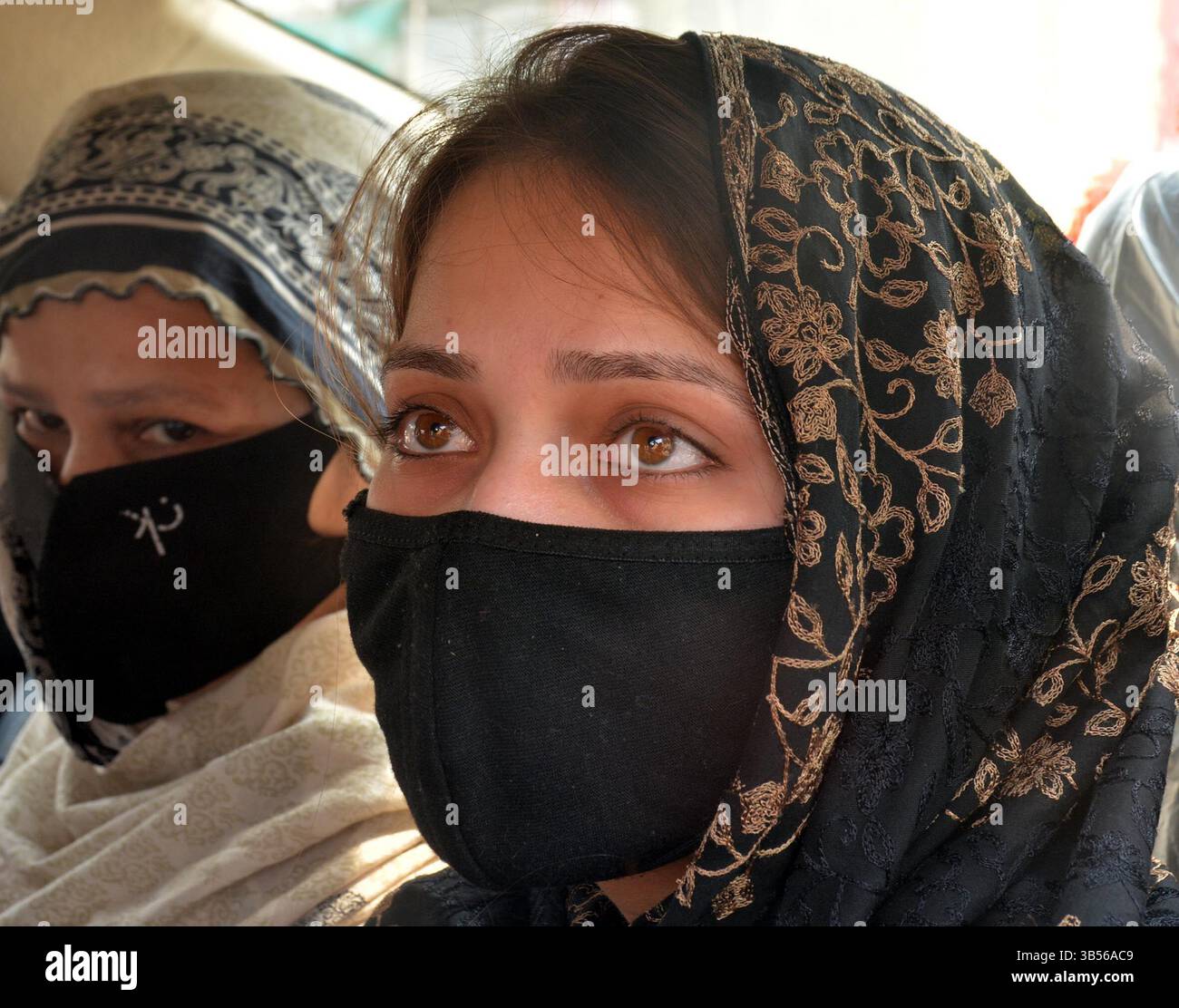 AMRITSAR, INDIA - MAY 1: Indian passport holder Namra from UP wait to ...