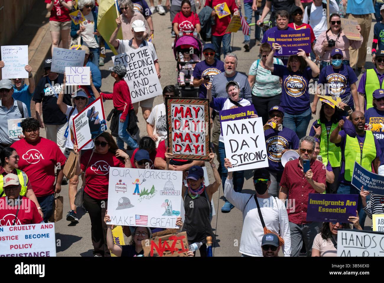 Demonstrators march to the White House during a May Day protest in ...