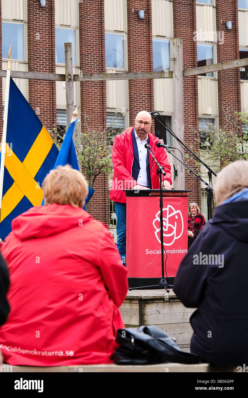 Social Democratic Party representative at May Day podium giving speech ...