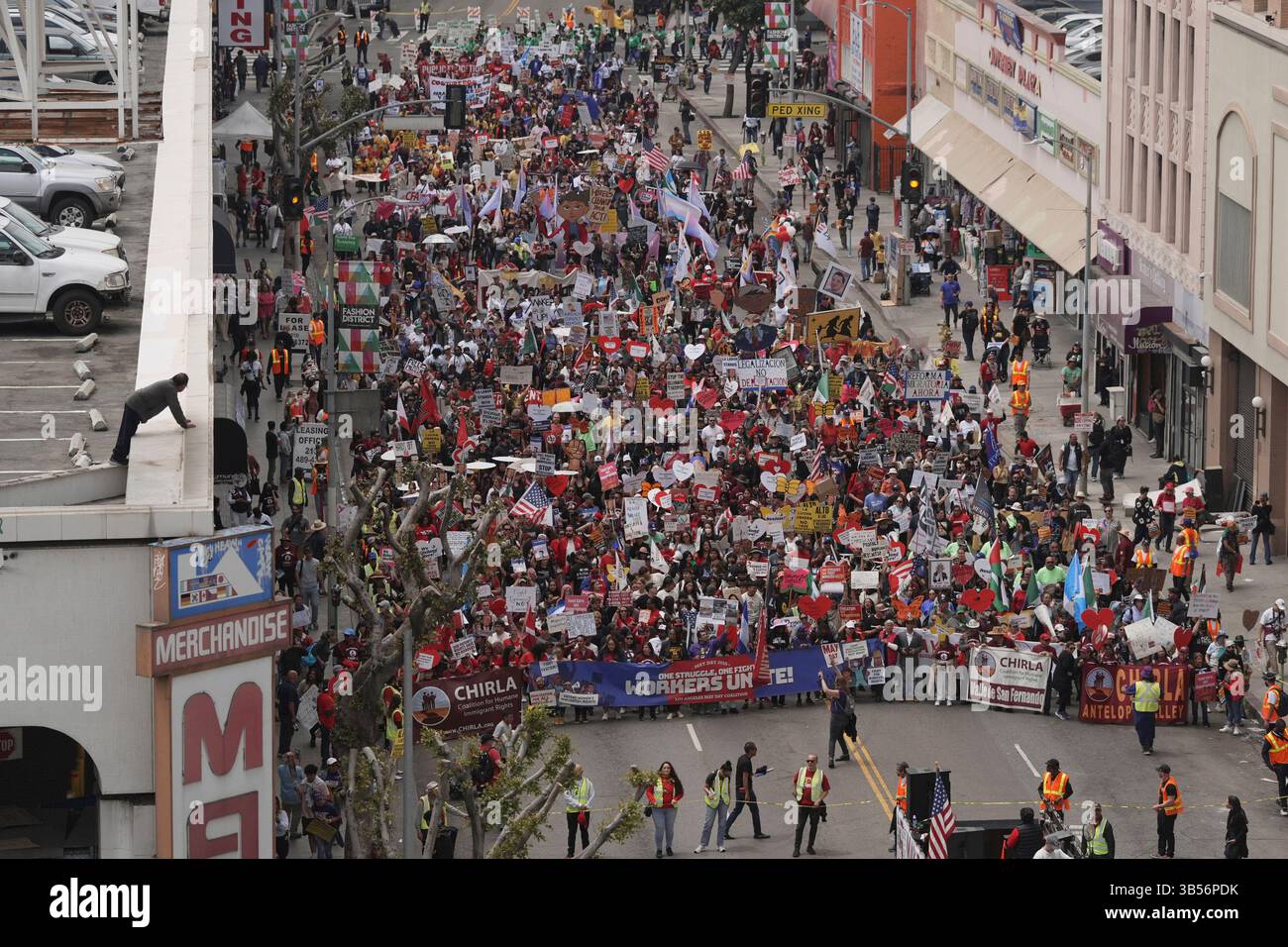 Demonstrators march during a May Day protest Thursday, May 1, 2025, in ...
