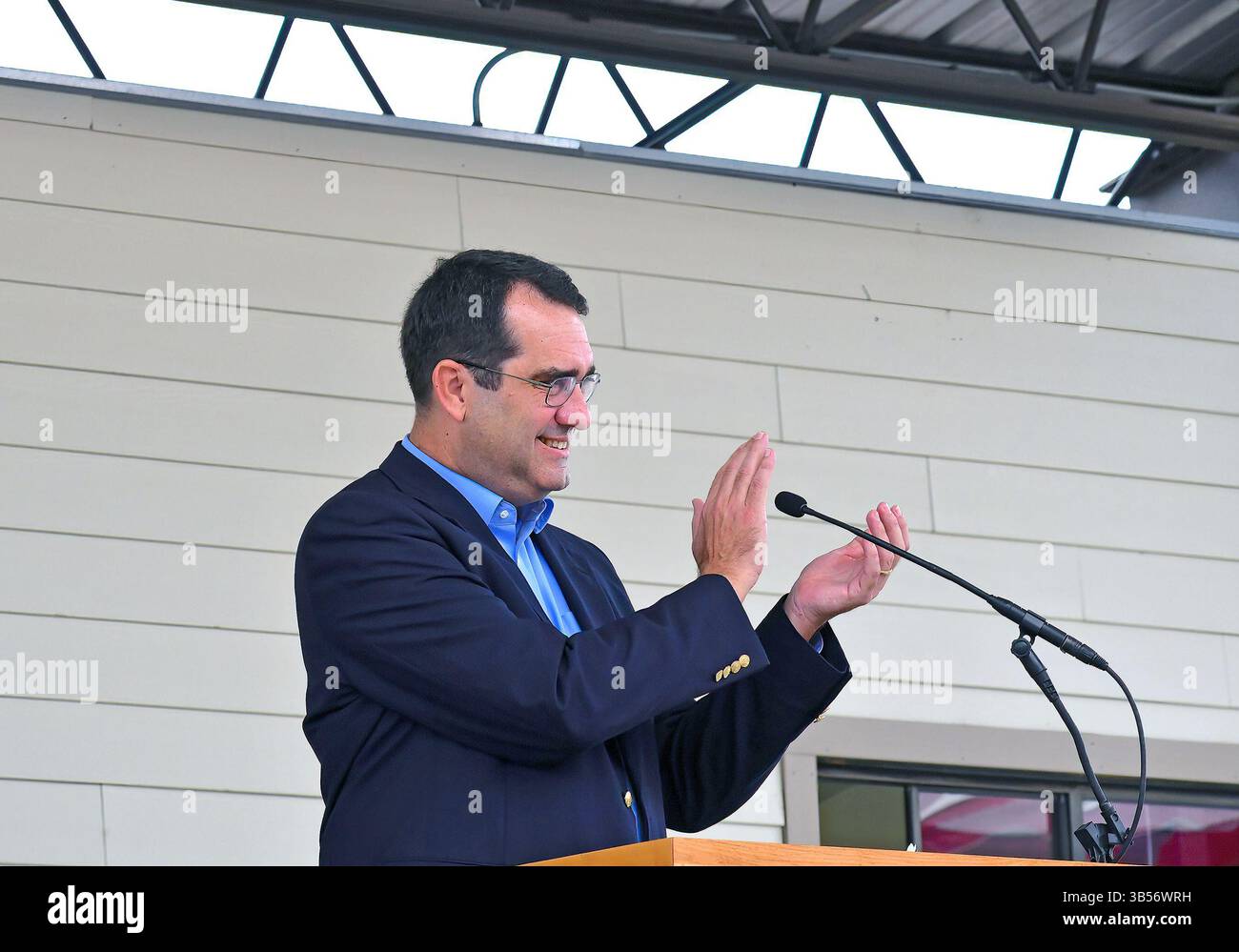 Woman points finger waves hi-res stock photography and images - Alamy