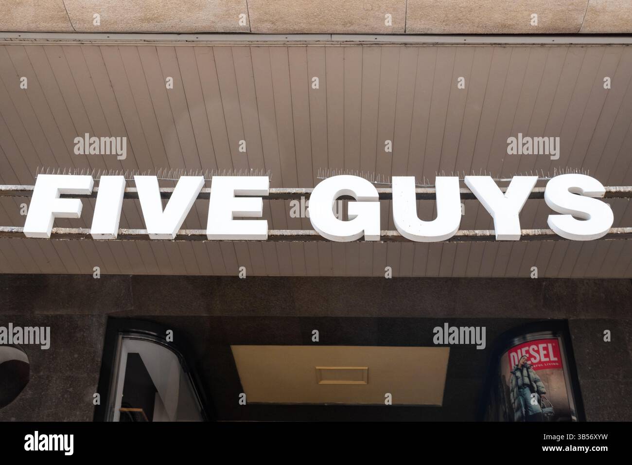 Milan, Italy - April, 08, 2025: Five Guys fast food restaurant ...