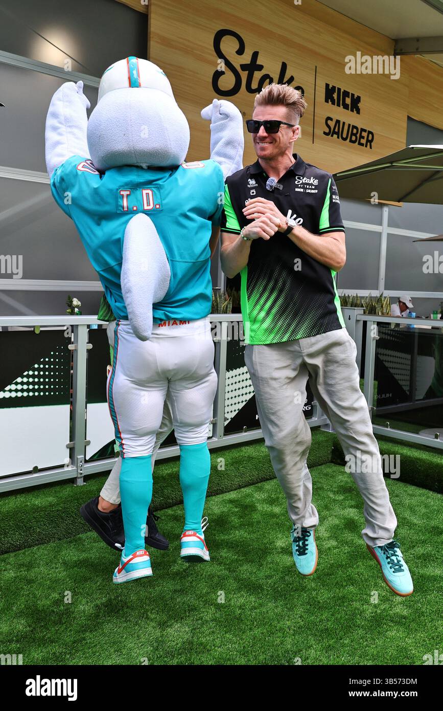 Miami, USA. 01st May, 2025. (L to R): T.D. (USA) Miami Dolphins Mascot ...