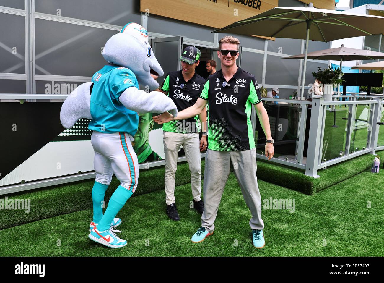 Miami, USA. 01st May, 2025. (L to R): T.D. (USA) Miami Dolphins Mascot ...