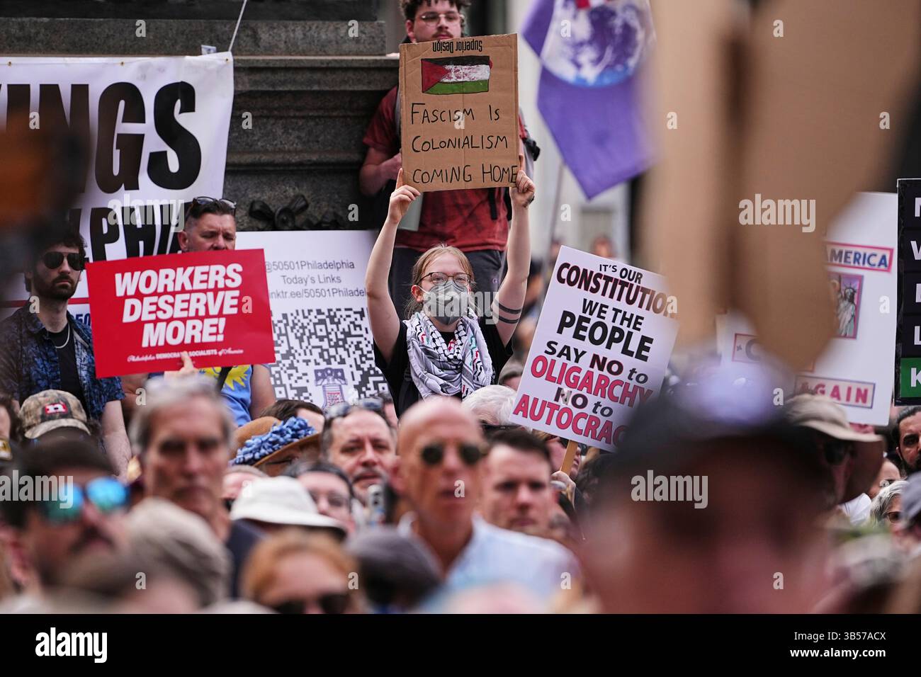 Protesters demonstrate during a May Day rally in Philadelphia, Thursday ...