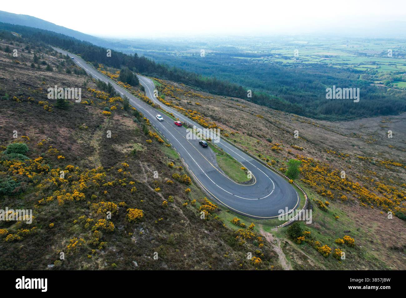 Aerial view of The Vee Pass winding through the Knockmealdown Mountains ...