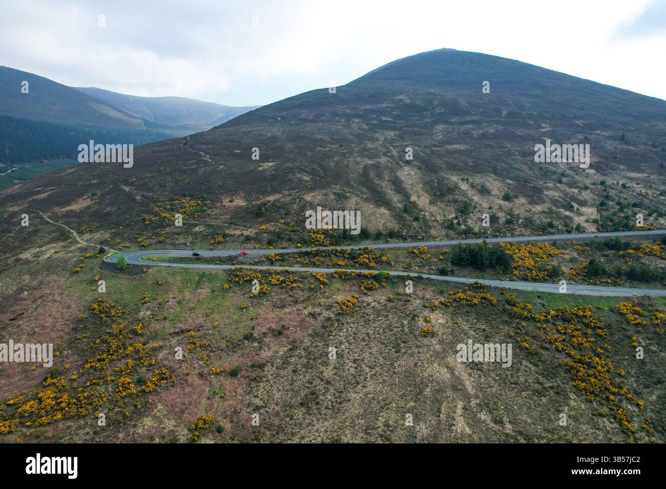 Aerial view of The Vee Pass winding through the Knockmealdown Mountains ...