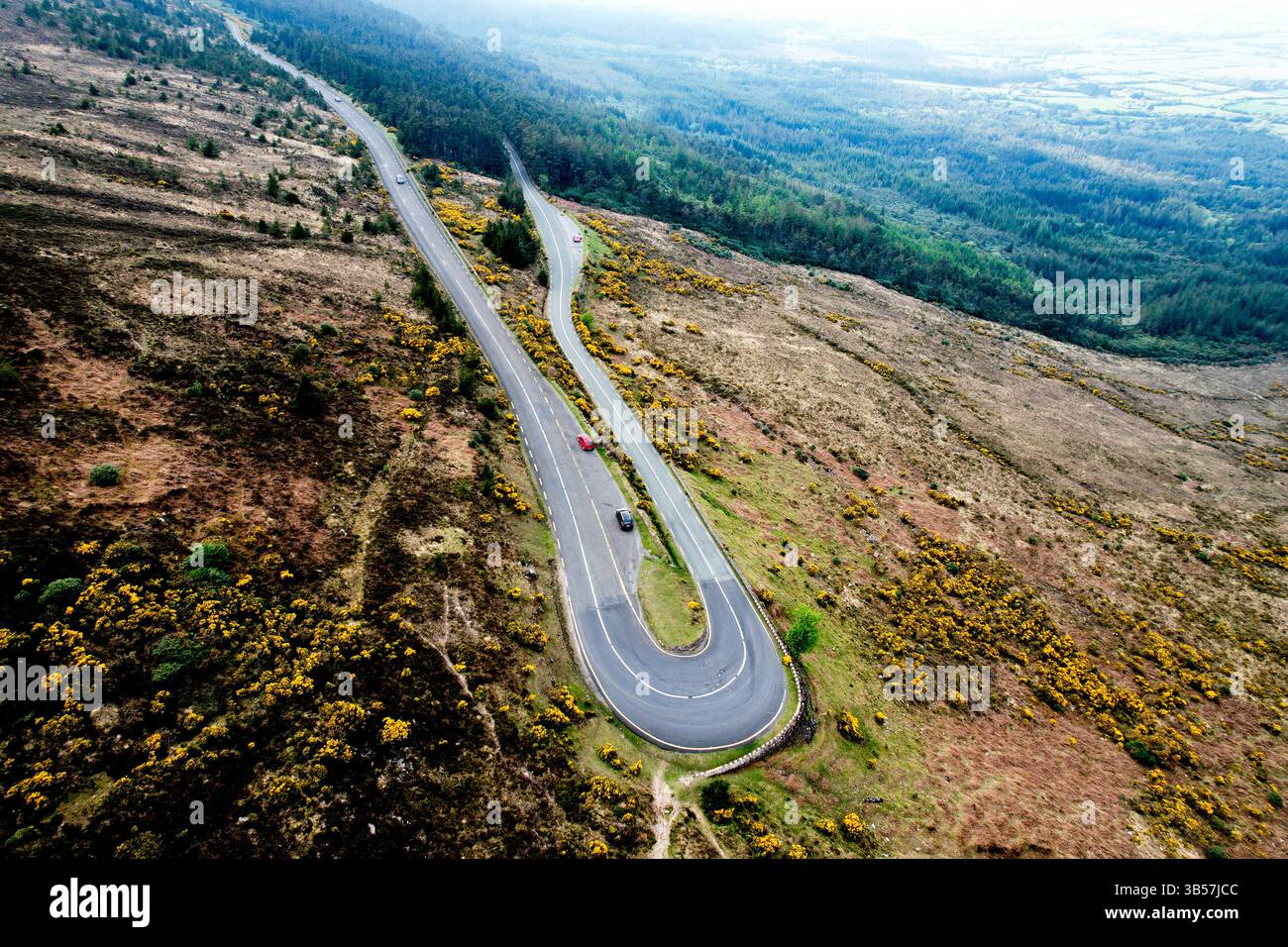 Aerial view of The Vee Pass winding through the Knockmealdown Mountains ...