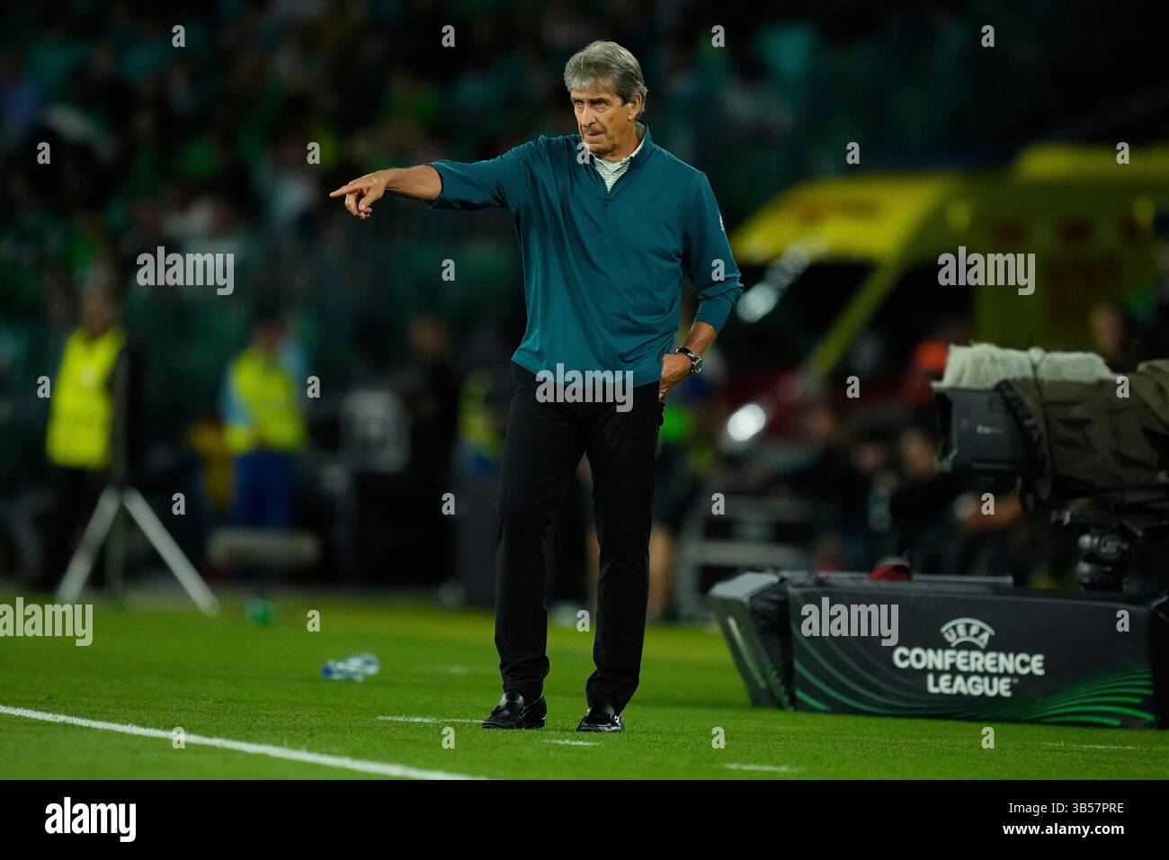 Betis' head coach Manuel Pellegrini gives instructions during the ...