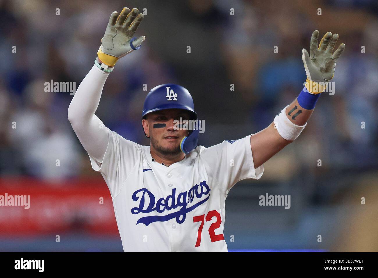 Miguel Rojas #72 of the Los Angeles Dodgers celebrates hitting an RBI ...