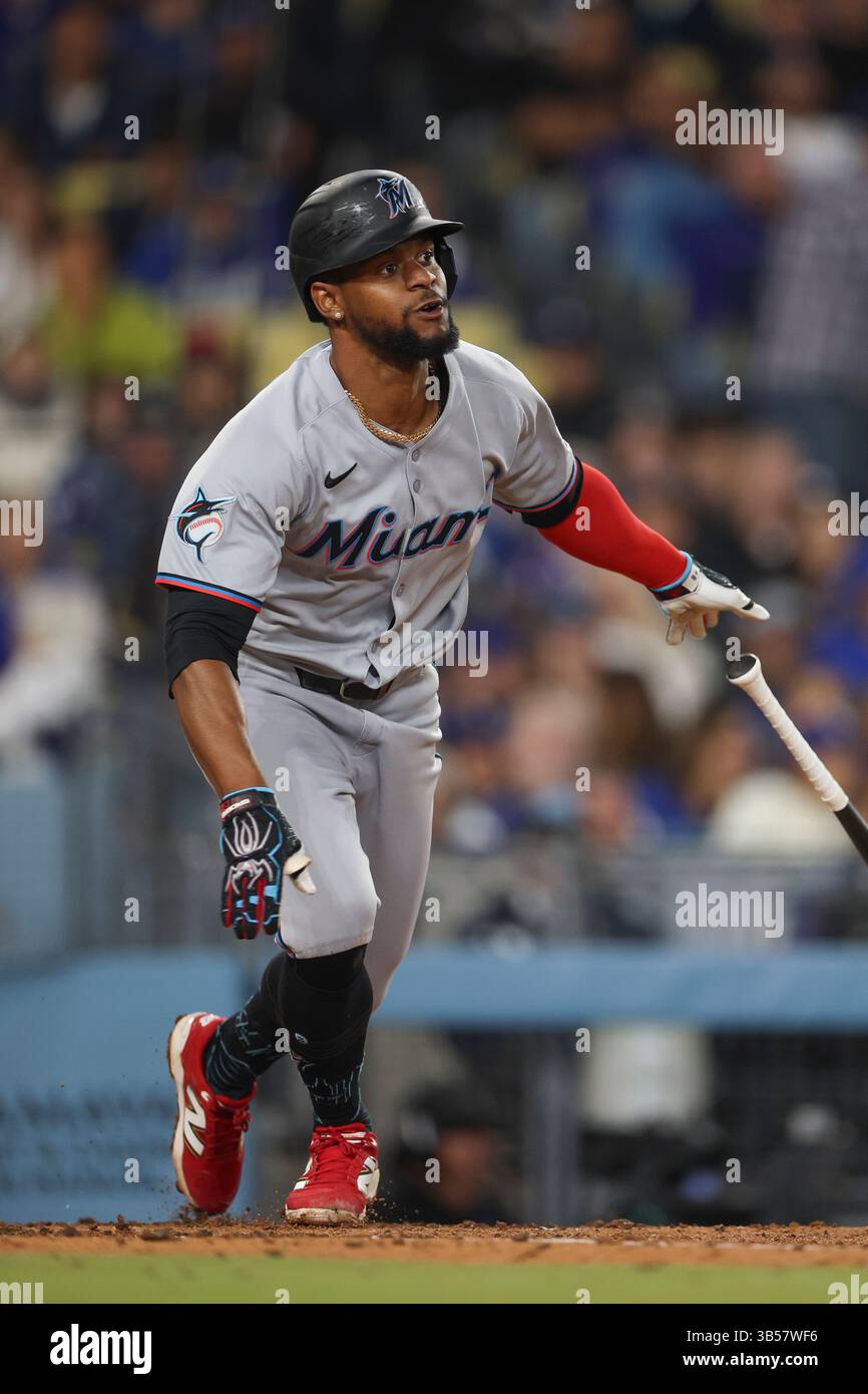 Otto Lopez #6 of the Miami Marlins runs toward first base on a single ...