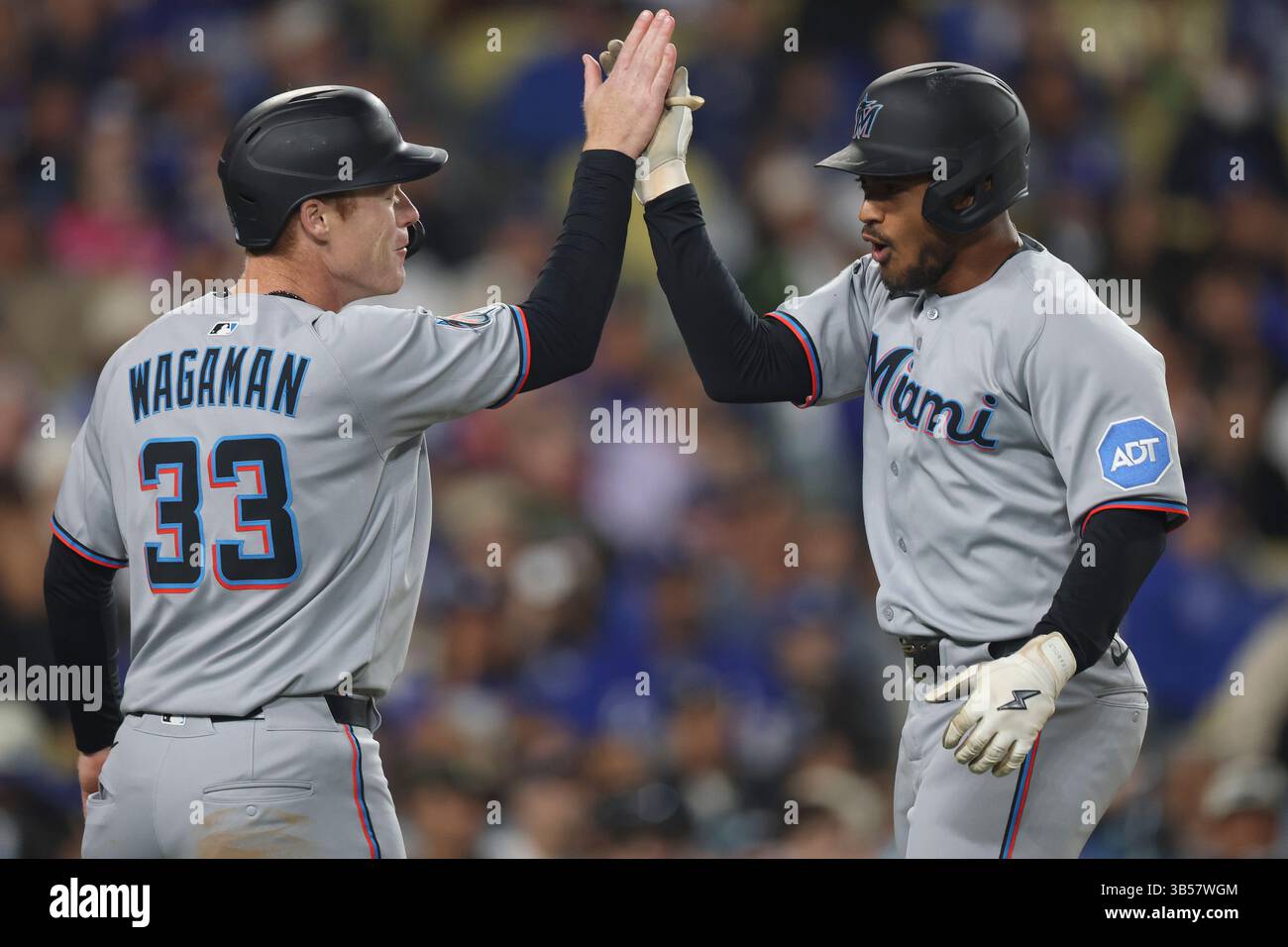 Dane Myers #54 of the Miami Marlins celebrates with Eric Wagaman #33 ...