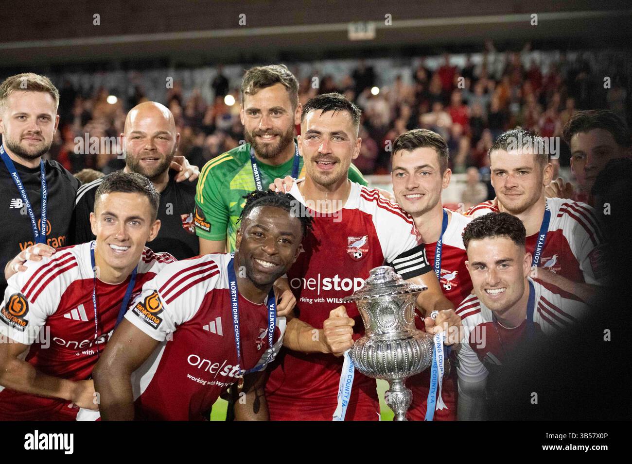 Scarborough players celebrate after winning the Cup during the North ...