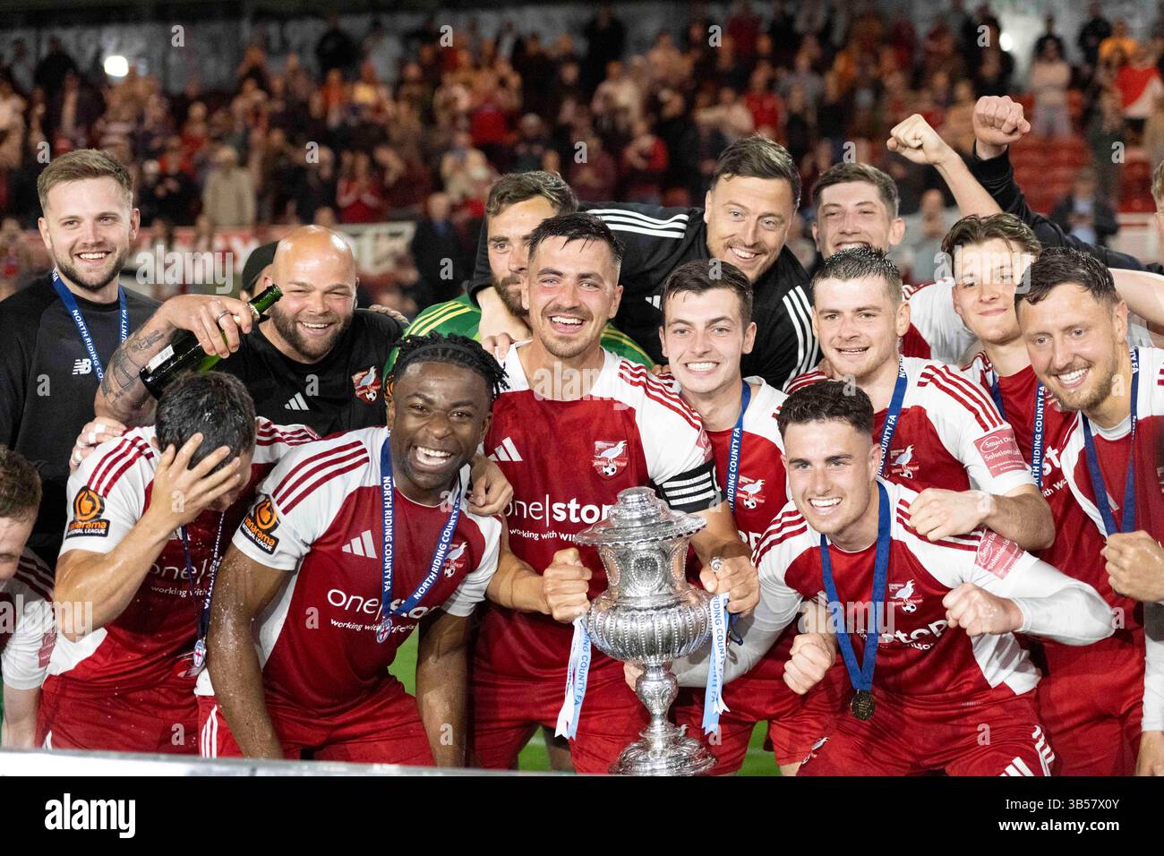 Scarborough players celebrate after winning the Cup during the North ...