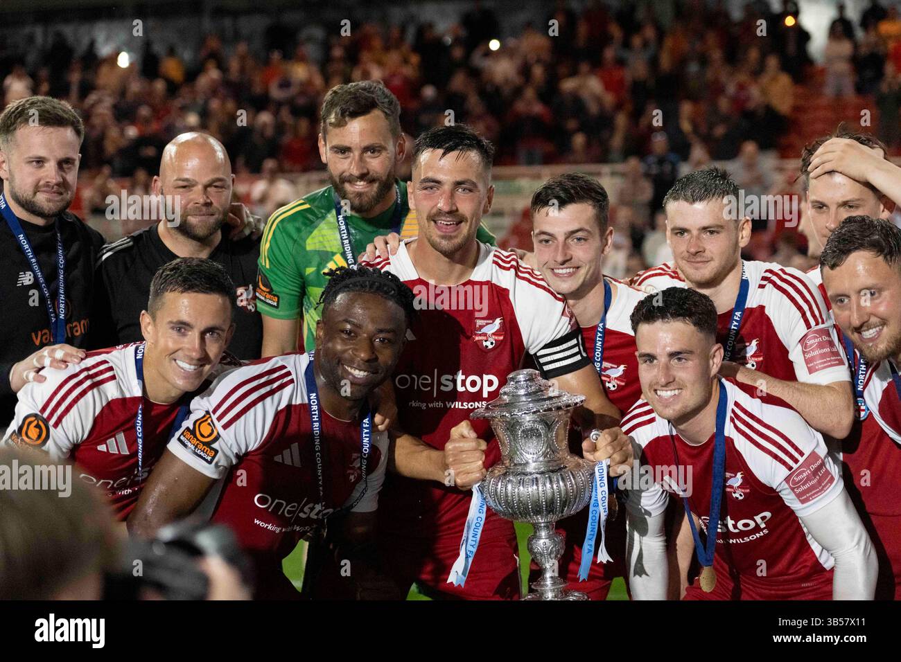 Scarborough players celebrate after winning the Cup during the North ...
