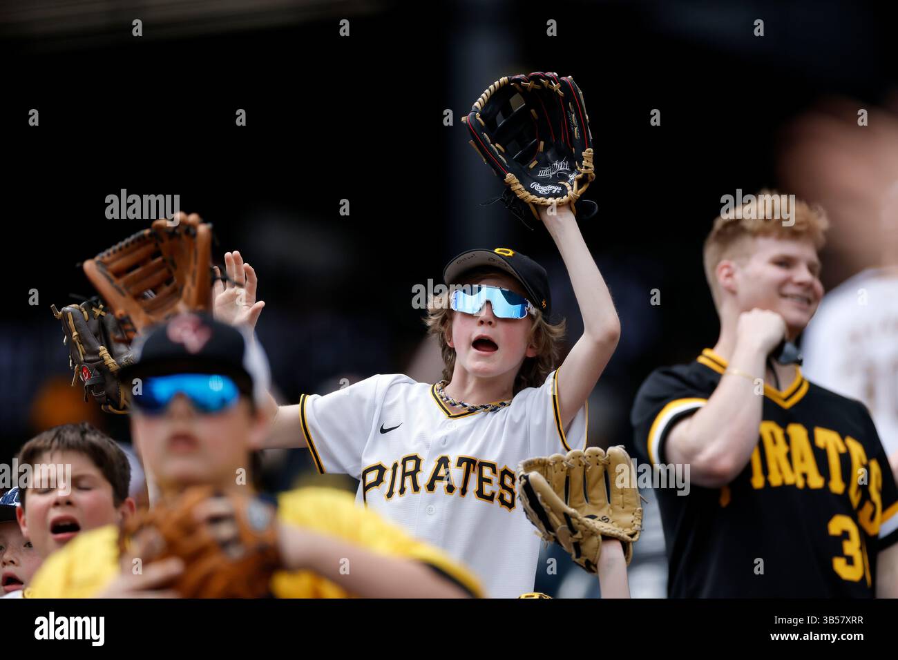 PITTSBURGH, PA - MAY 01: Young Pittsburgh Pirates fans call for a ball ...