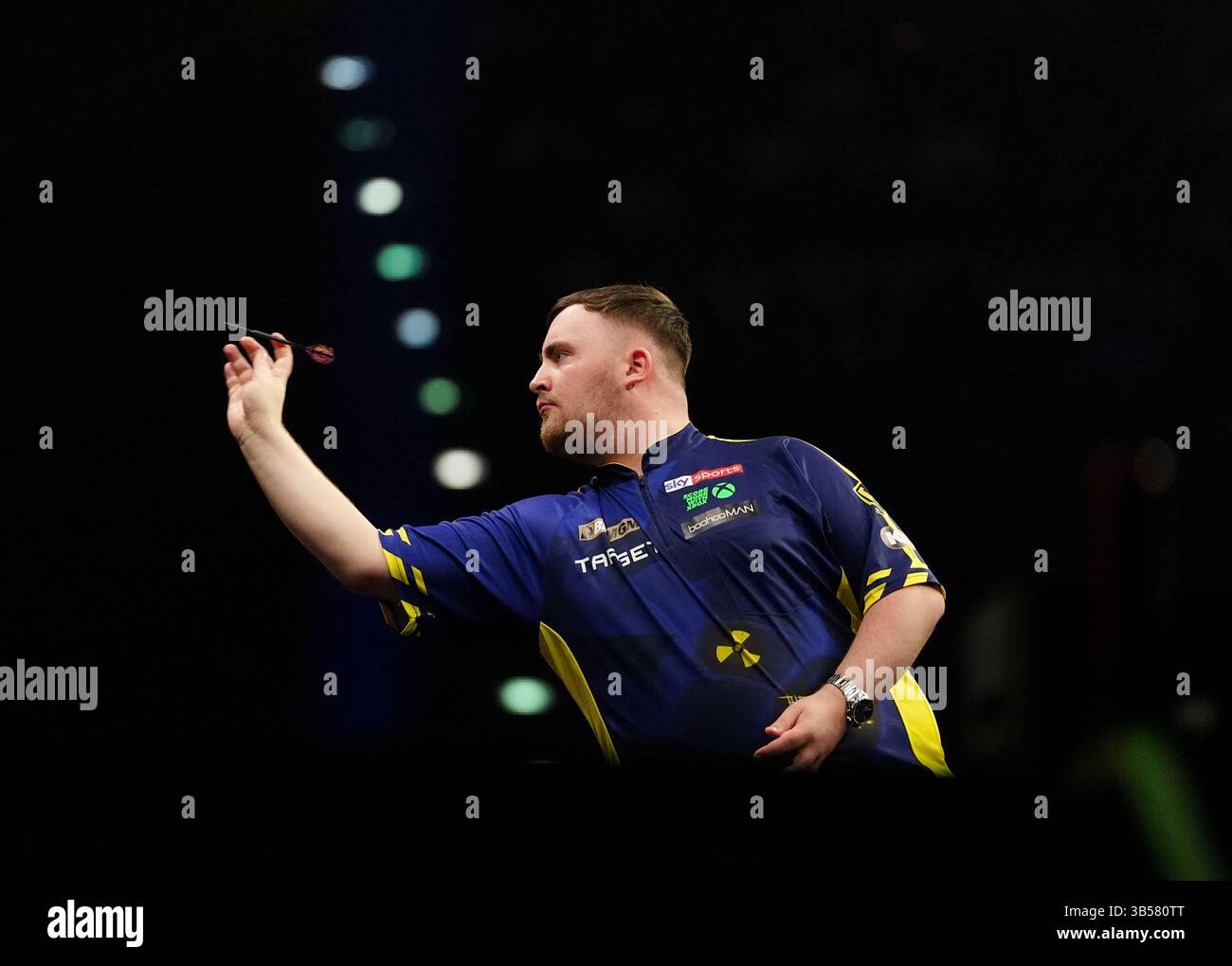 Luke Littler in action against Nathan Aspinall during night thirteen of ...