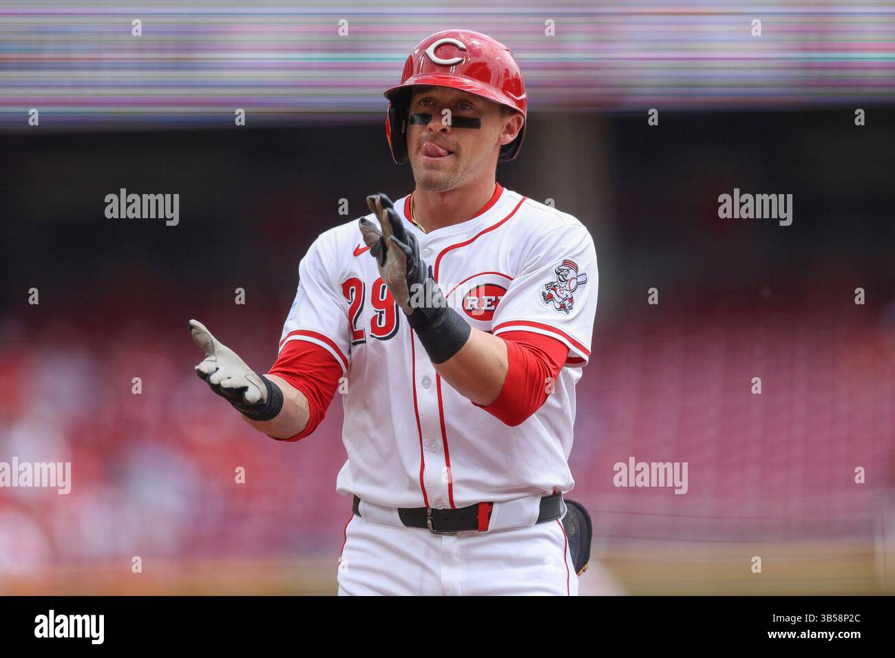 Cincinnati Reds' TJ Friedl reacts after hitting a single during the ...