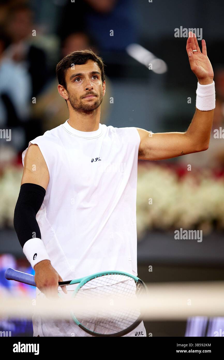 MADRID, SPAIN - MAY 01: Lorenzo Musetti of Italy against Gabriel Diallo ...
