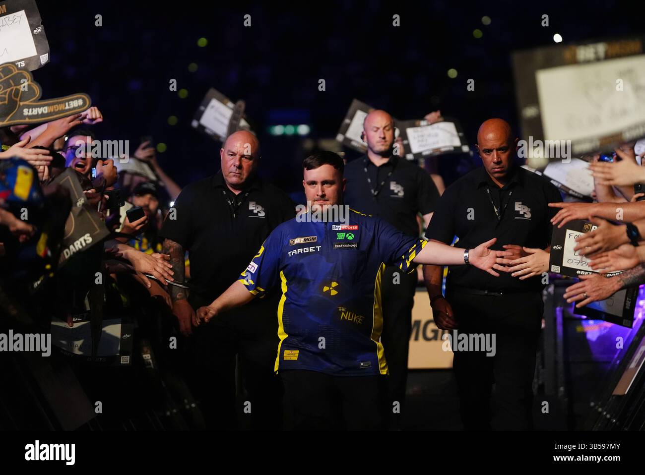 Luke littler walks out to play against Michael van Gerwen during night ...