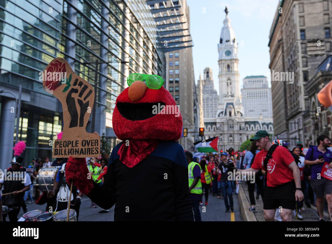 Demonstrators march during a May Day rally in Philadelphia, Thursday ...