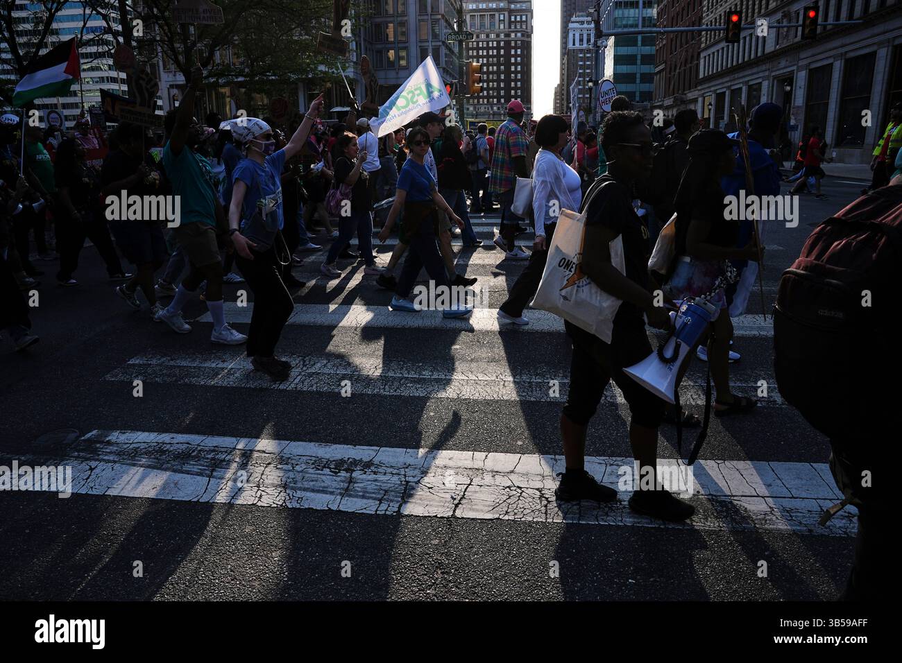 Demonstrators march during a May Day rally in Philadelphia, Thursday ...