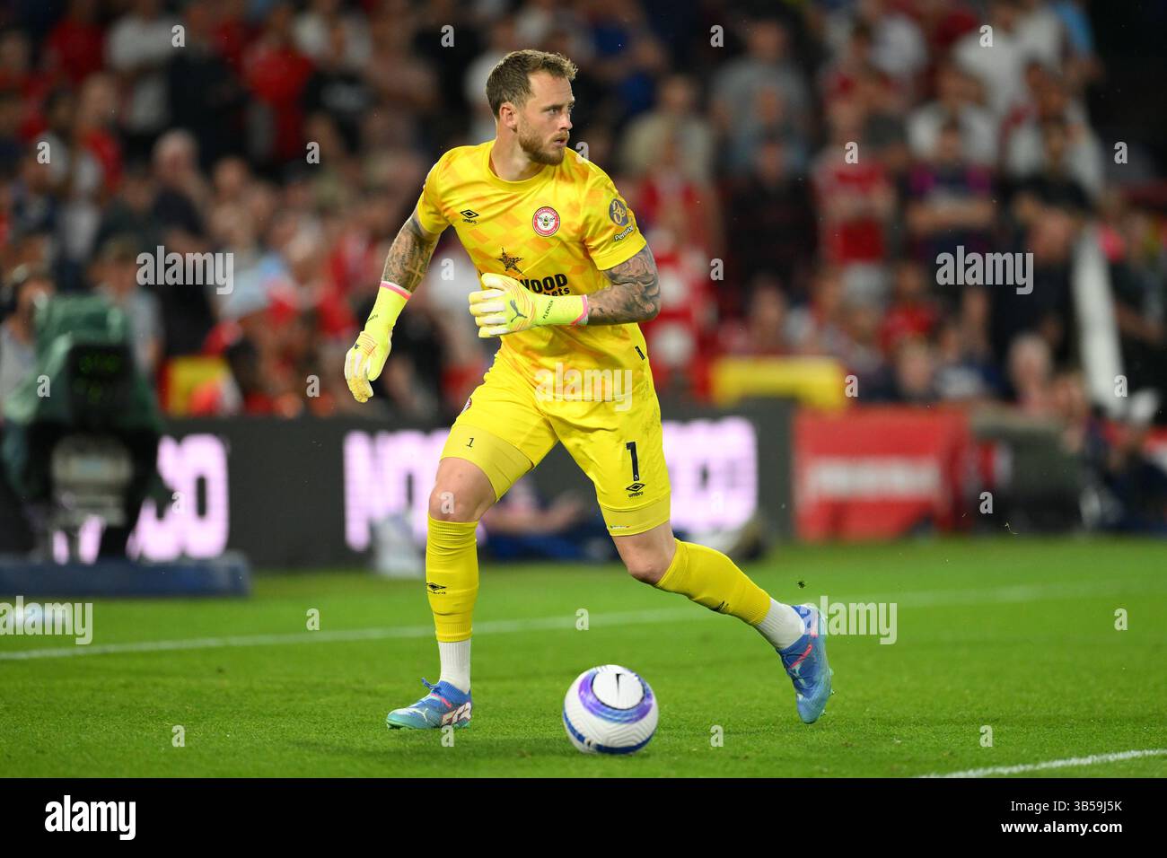Mark Flekken of Brentford in action during the Premier League match ...