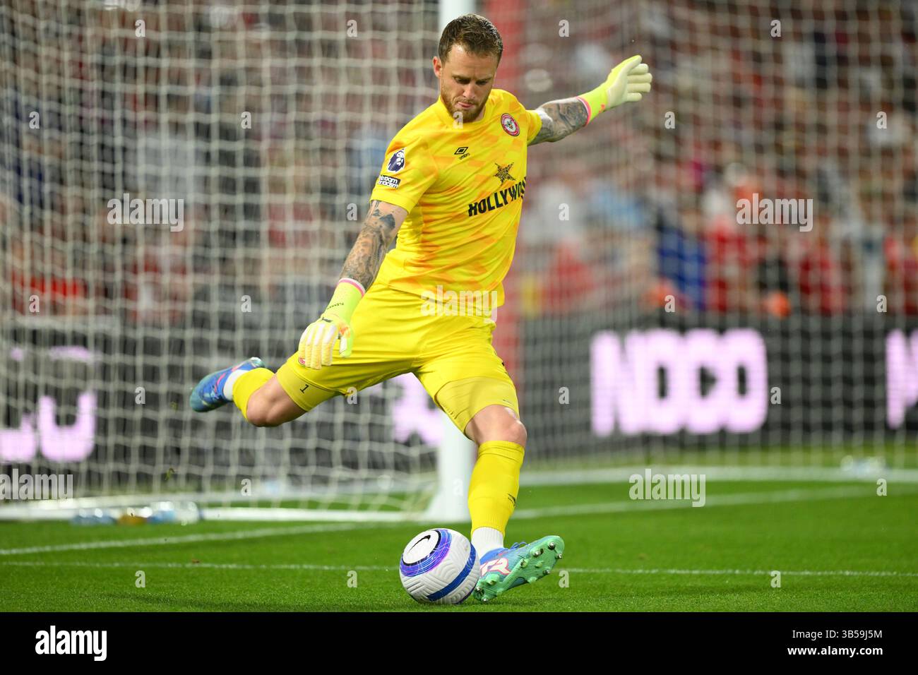 Mark Flekken of Brentford in action during the Premier League match ...