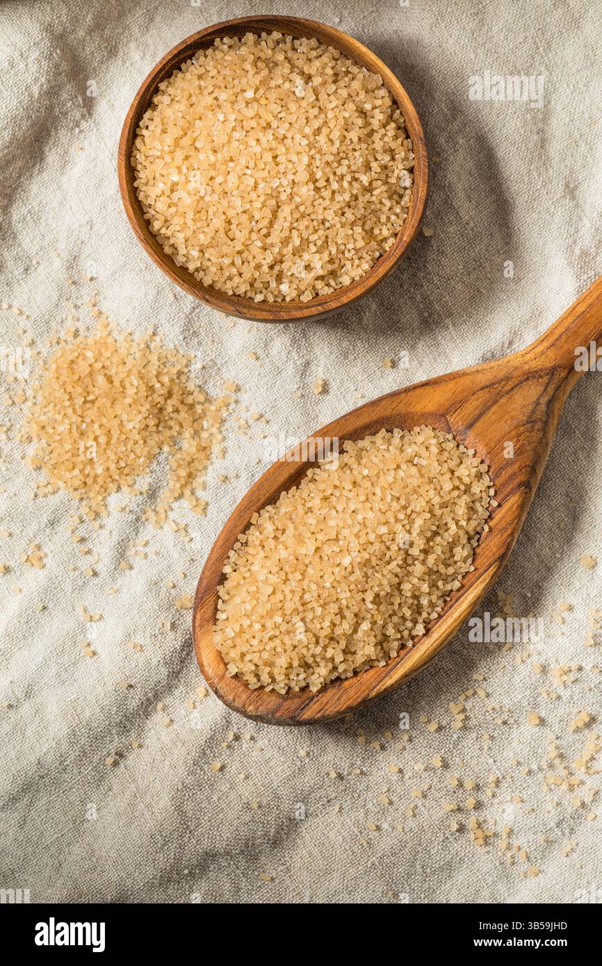 Raw Cane Turbinado Sugar in a Spoon Stock Photo - Alamy
