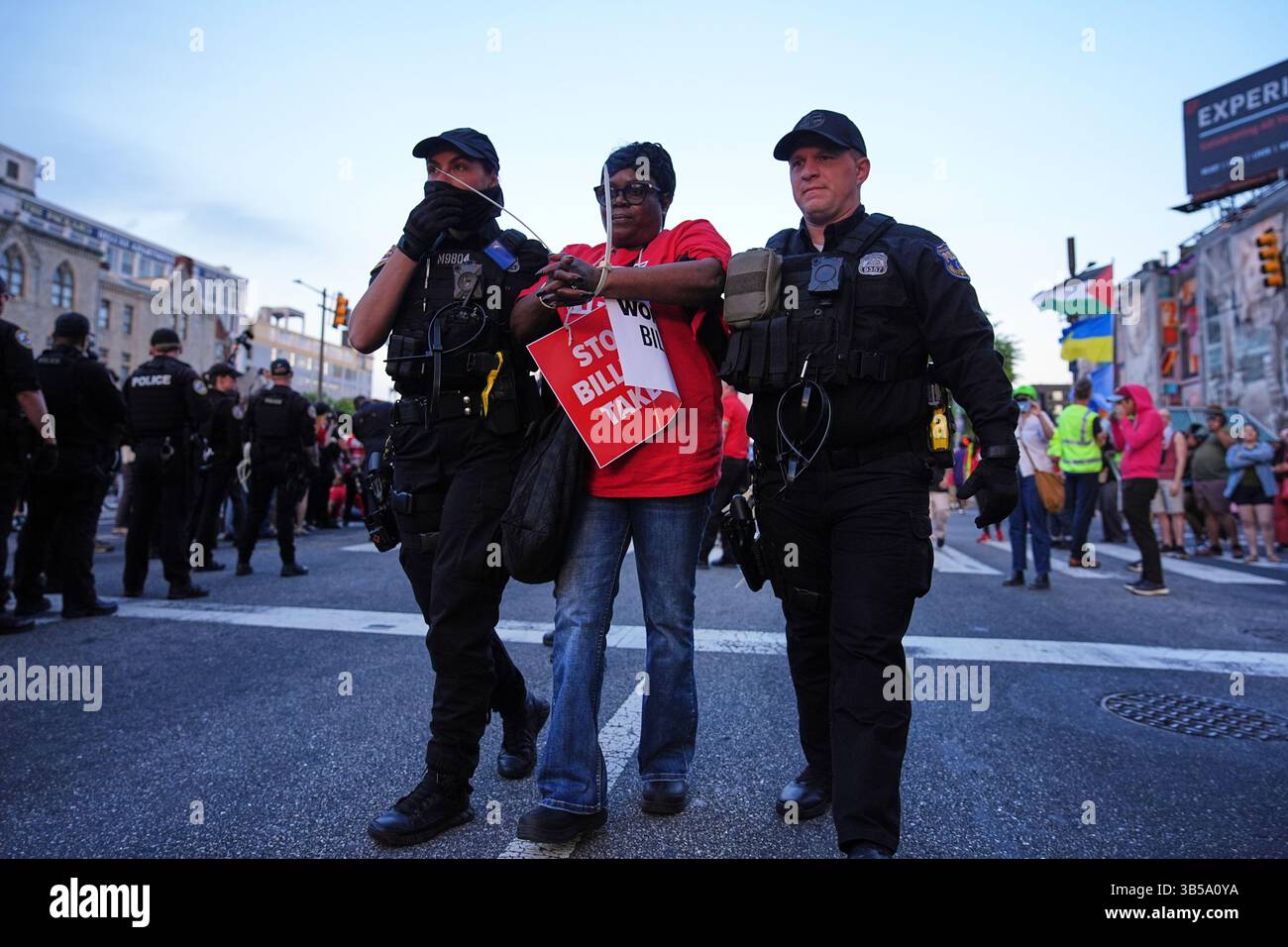 Demonstrators are detained during a May Day rally in Philadelphia ...
