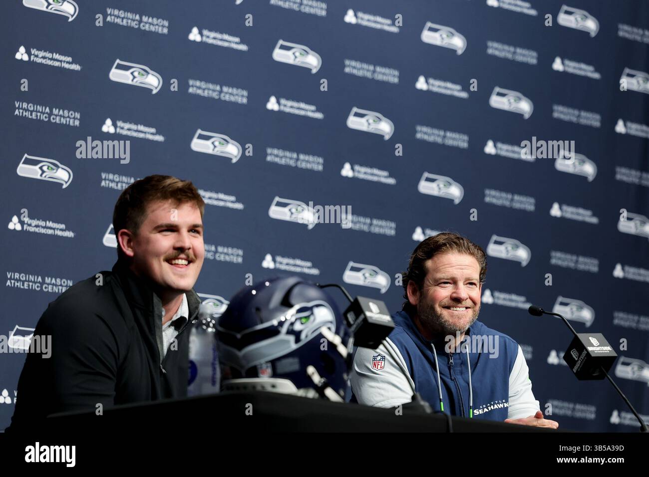 Seattle Seahawks general manager John Schneider, right, introduces ...