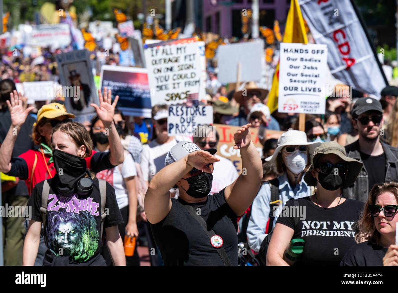 Seattle, USA. 1st May 2025. People marching downtown after gathering at ...