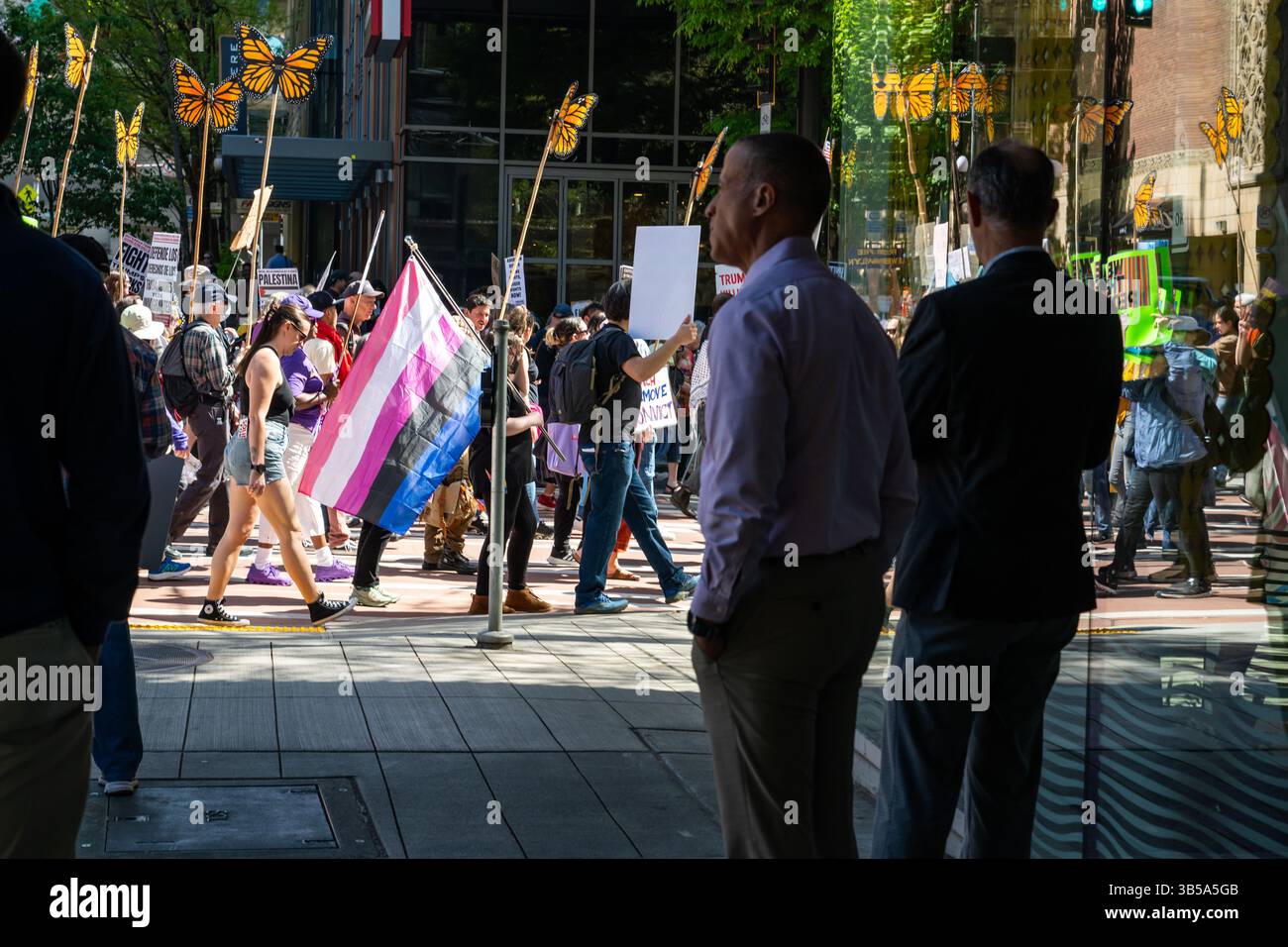 Seattle, USA. 1st May 2025. People marching downtown after gathering at ...