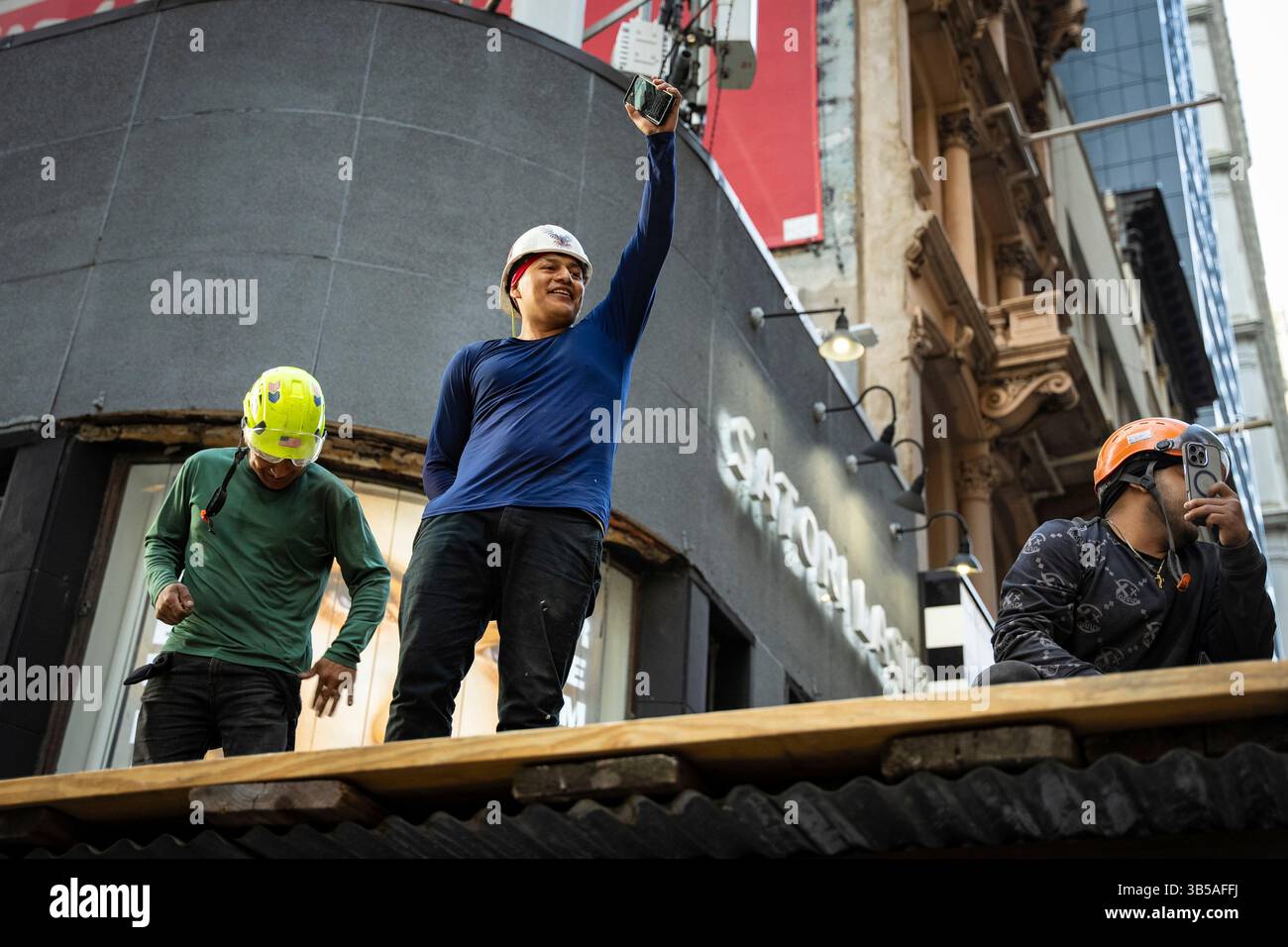 Local construction workers cheer as the NYCLU's May Day rally for ...
