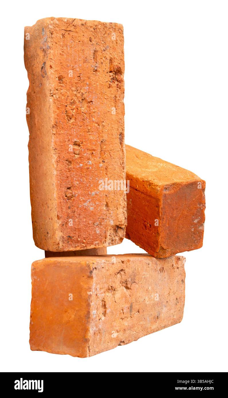 Side view of three old red or orange bricks in stack is isolated on ...